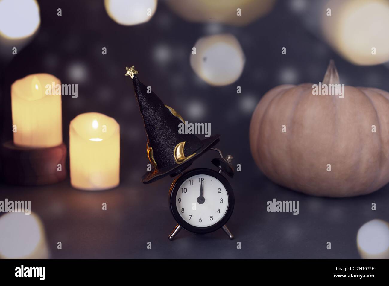 Witch on clock hi-res stock photography and images - Alamy
