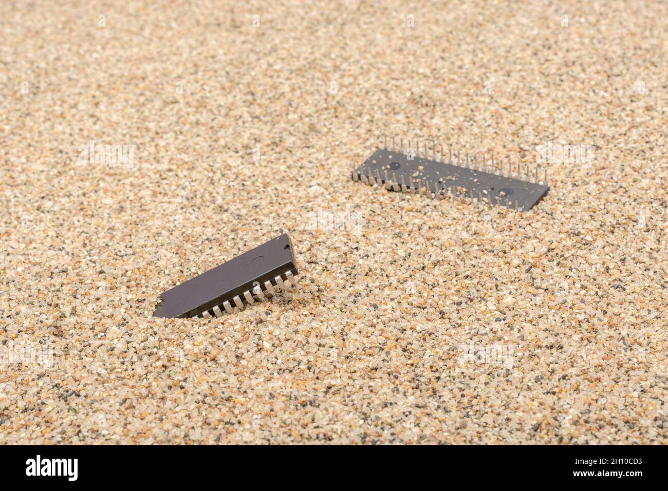 Ics buried in sand hi-res stock photography and images - Alamy