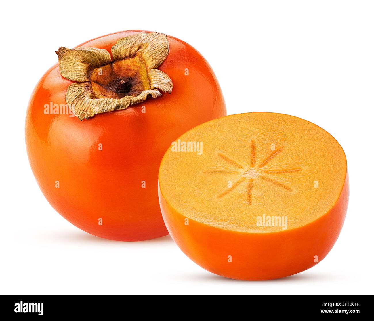 Persimmon fruit and one cut in half isolated on white background ...