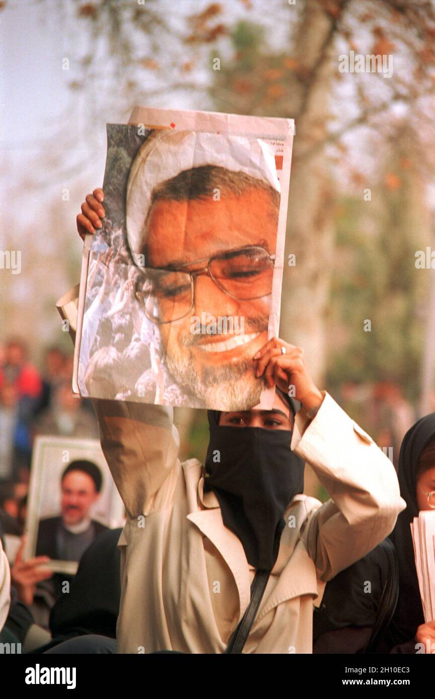 Carrying posters hi-res stock photography and images - Alamy