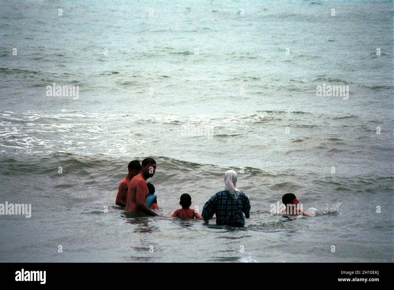 An Iranian family join in Caspian sea in north of Iran. Women cannot ...