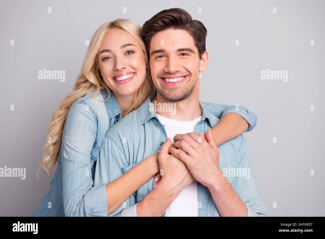 Portrait of attractive cheerful tender couple life partners hugging ...