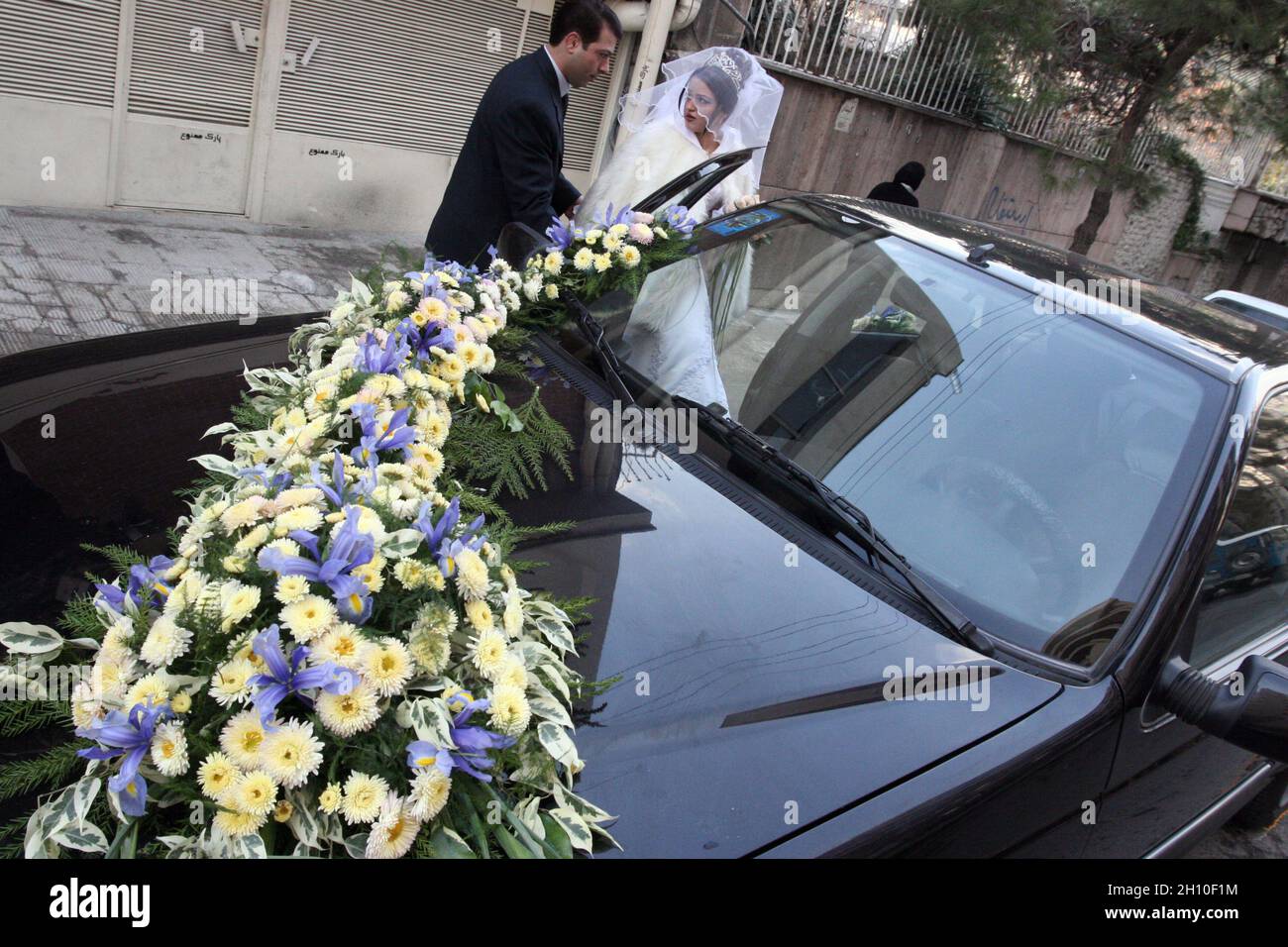 Iranian young married ready for going to their ceremony after make up ...