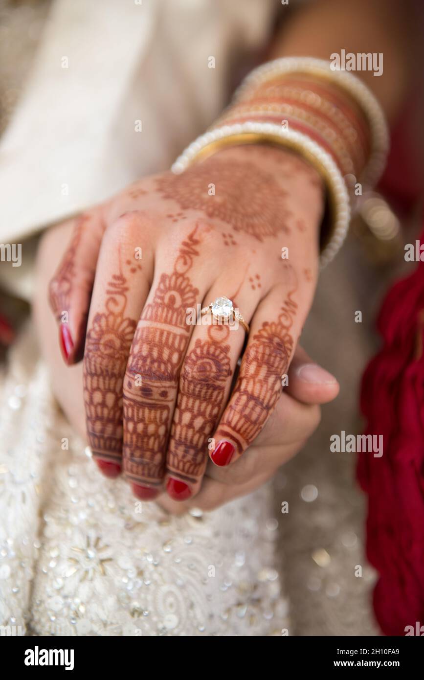 Vertical closeup of the bride's hand. Western American Sikh wedding ...