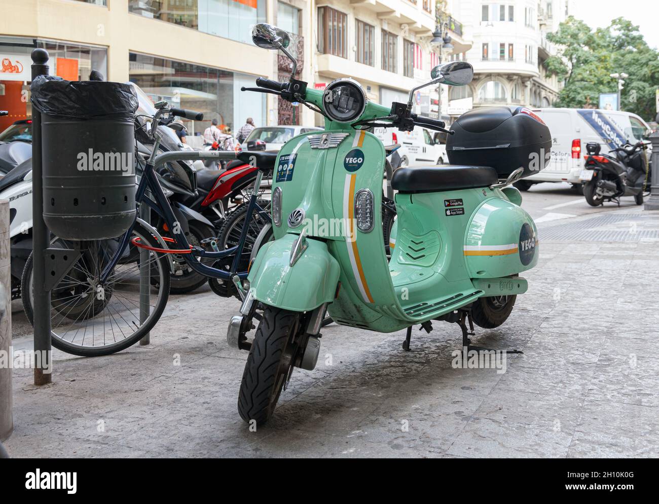 VALENCIA, SPAIN - OCTOBER 14, 2021: Electric motorcycle sharing system ...