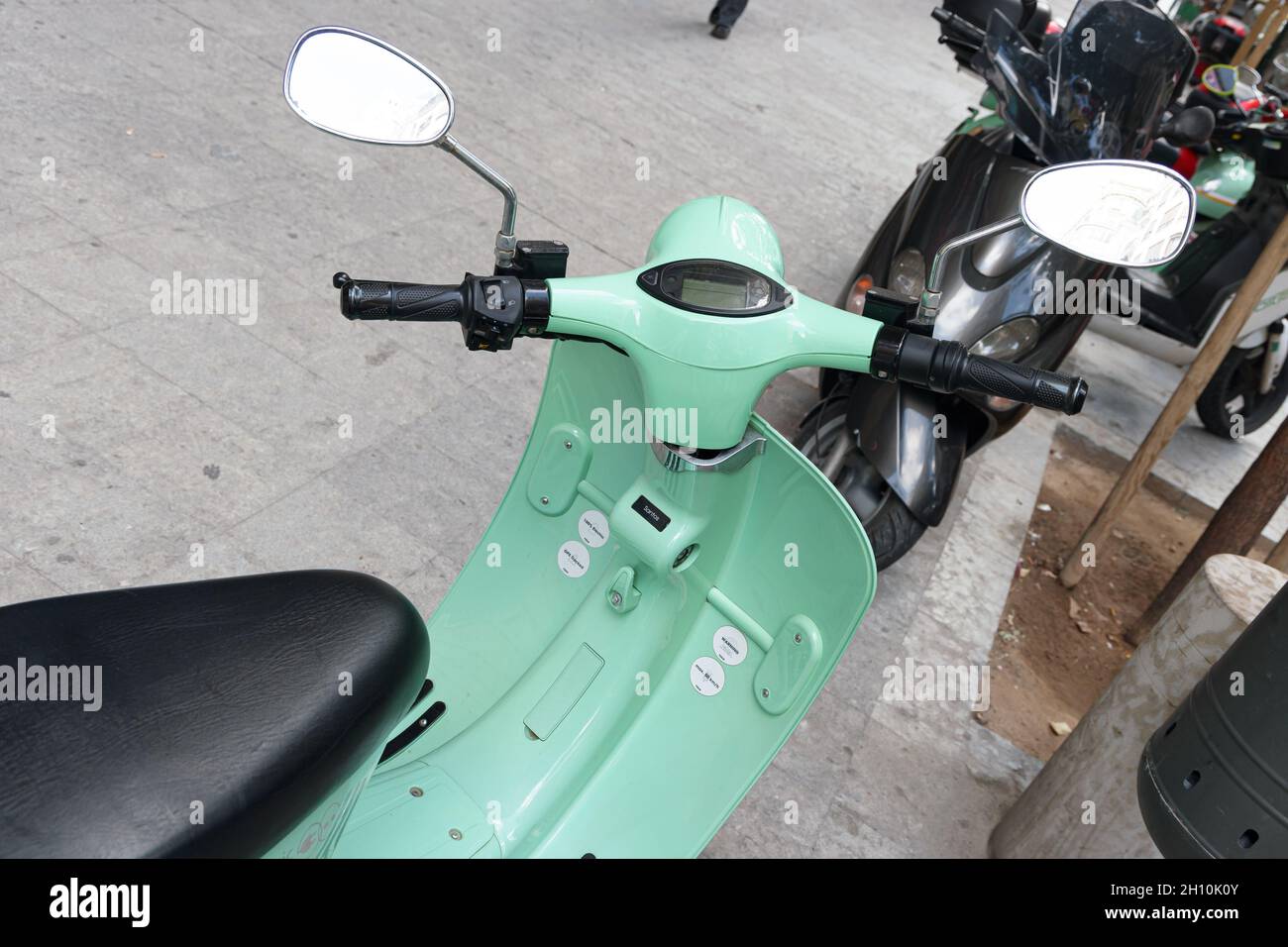 VALENCIA, SPAIN - OCTOBER 14, 2021: Electric motorcycle sharing system ...