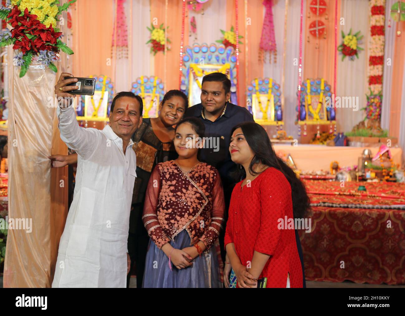 Beawar, India. 14th Oct, 2021. Hindu devotees takes selfie after Garba ...