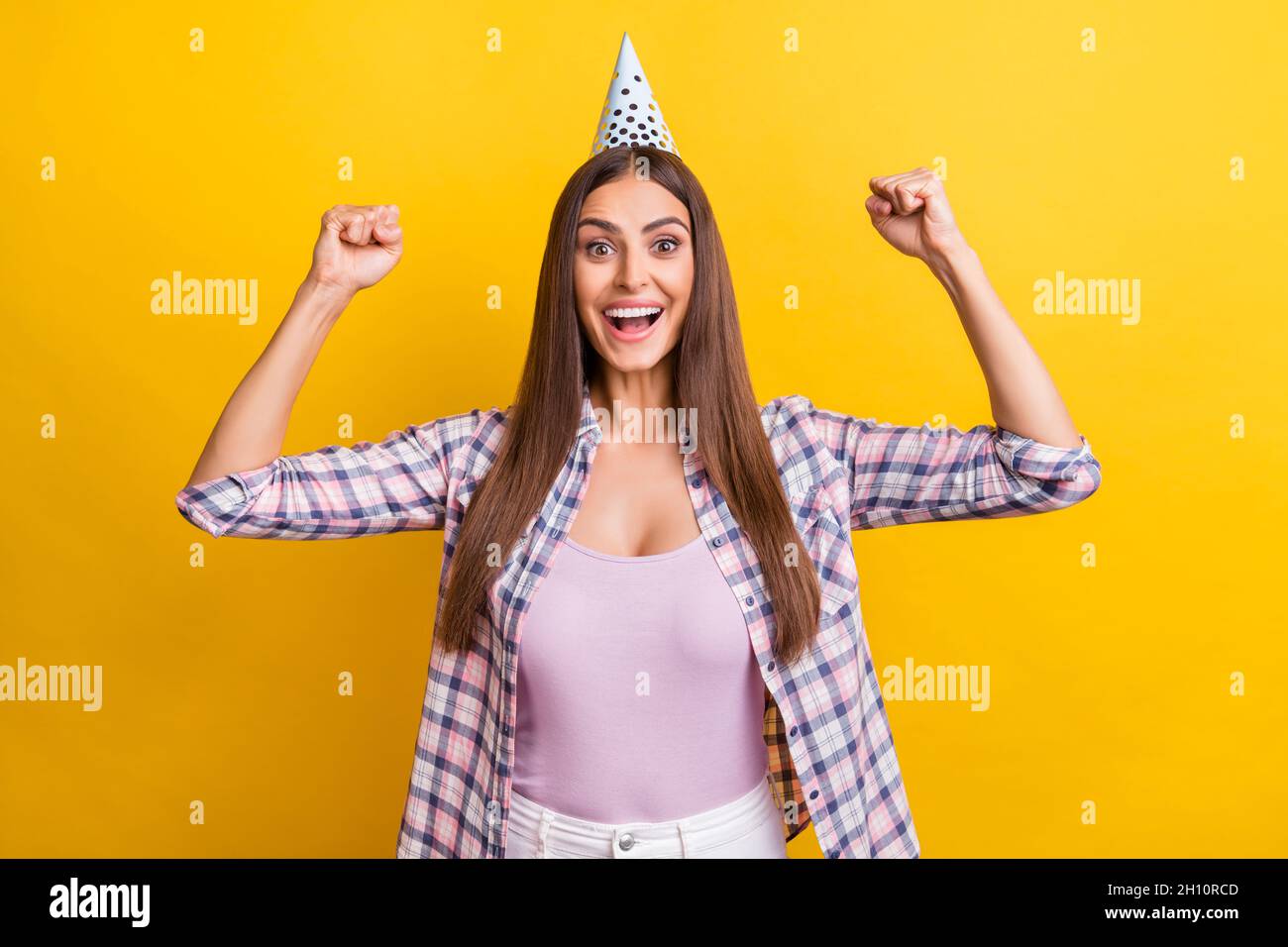 Photo of young woman happy positive smile wear cone celebrate victory ...
