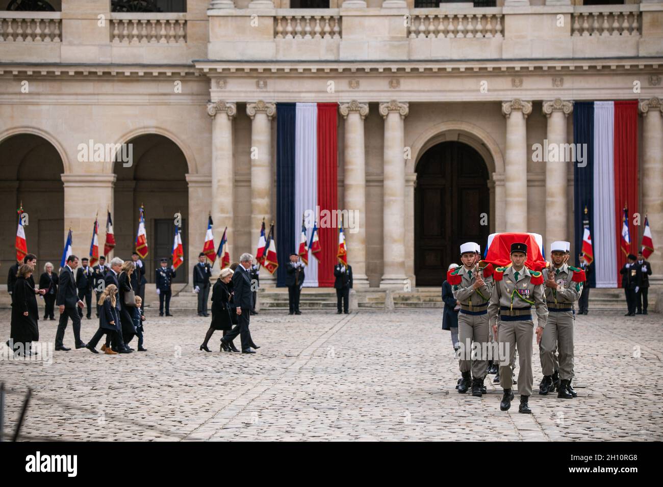 Paris, France. 15th Oct, 2021. Hubert Germain's coffin followed by his ...