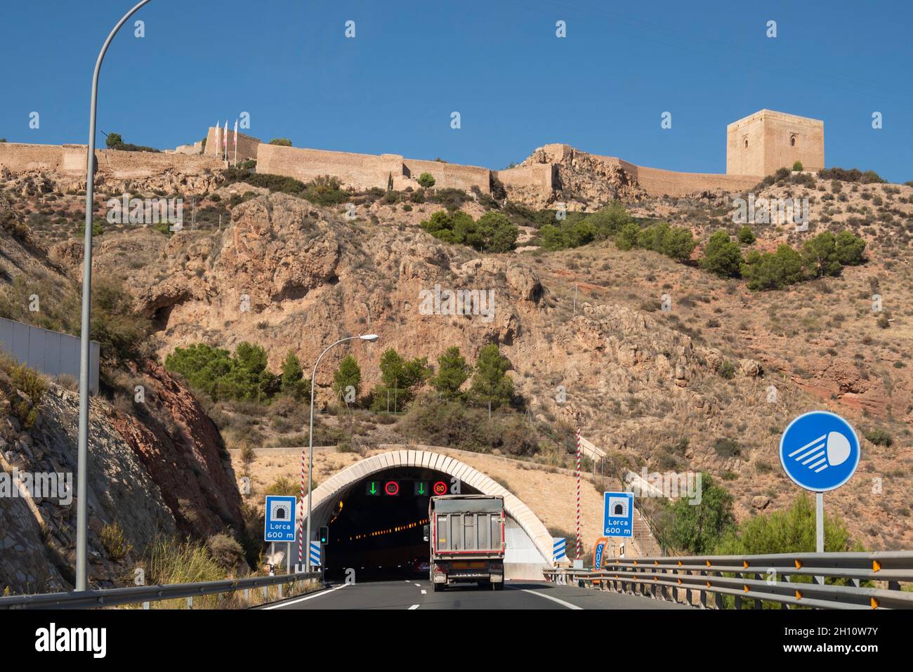 Castle of Lorca, above the A-7 road tunnel in Lorca, Region of Murcia ...