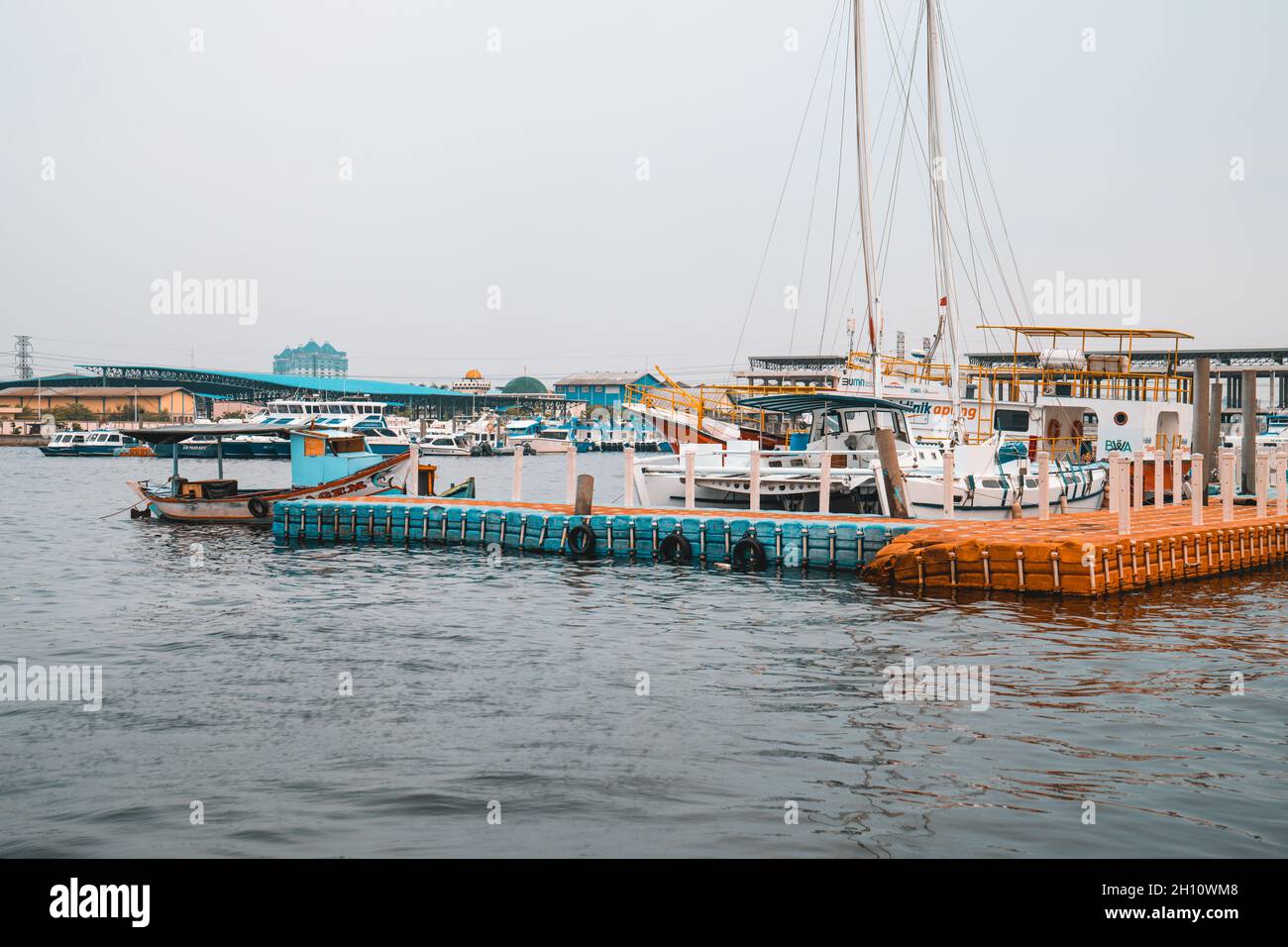 Port of Tanjung Priok on a gloomy day in Jakarta, Indonesia Stock Photo ...