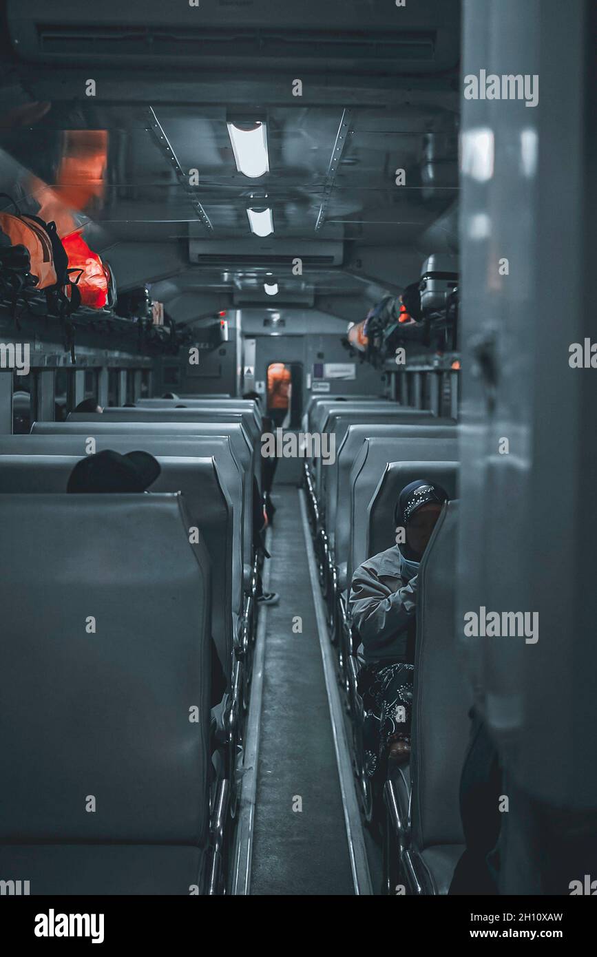 Vertical shot of a narrow train passageway between seats Stock Photo ...