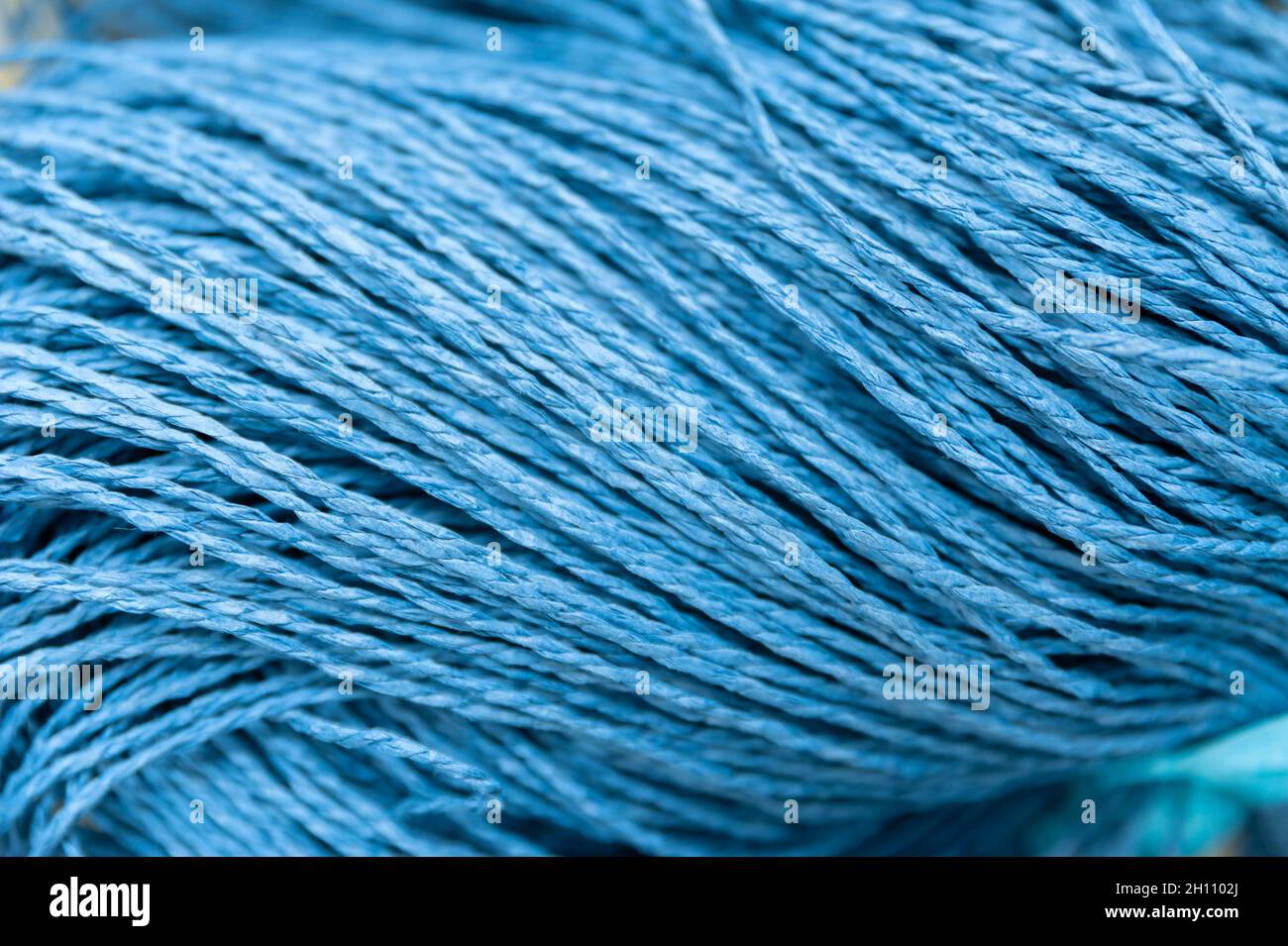 The blue rope, line, hawser, lanyard, lashing, lap,rope, string, cord ...