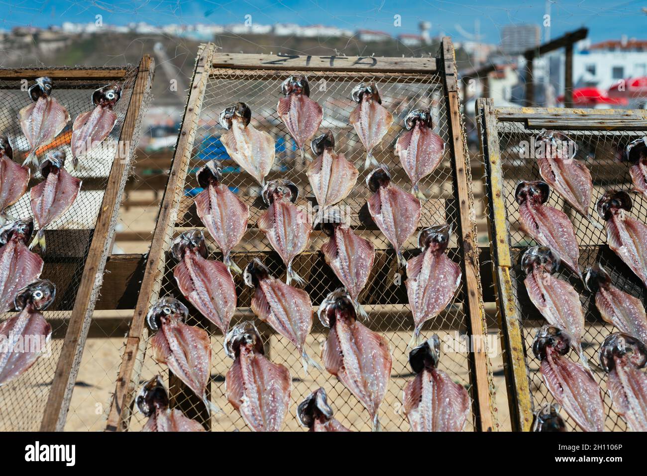 Fish drying outdoor in the traditional way Stock Photo - Alamy