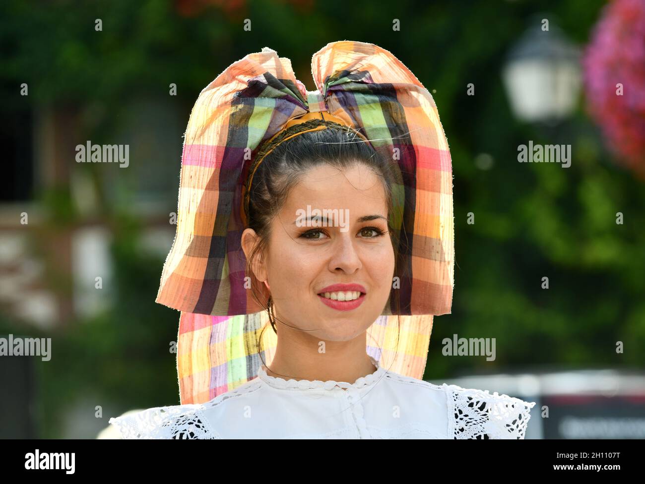 Traditional Alsace folk dancer wearing Alsation costume in the village ...