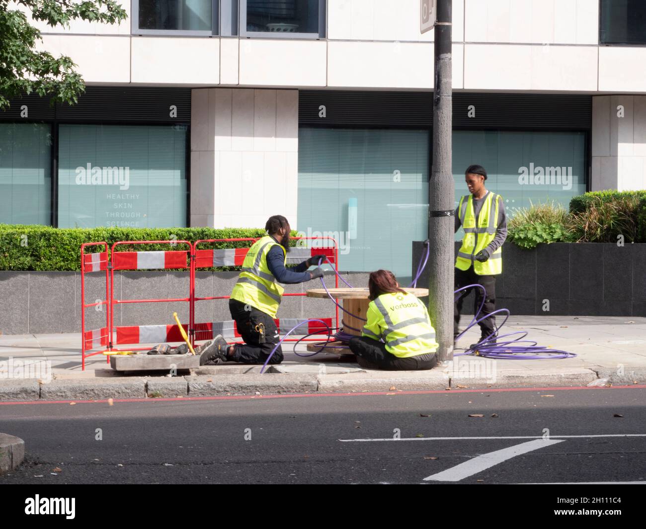 Installers fitting cabling for Vorboss fibre networks in Central London ...