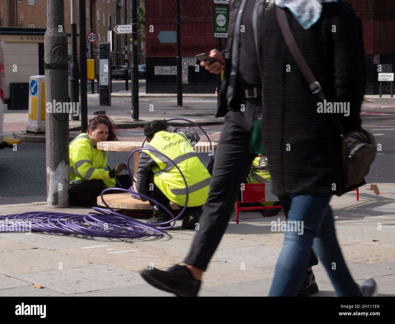 Installers fitting cabling for Vorboss fibre networks in Central London ...
