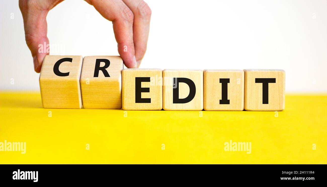 Credit to the edit symbol. Businessman turns wooden cubes and changes ...