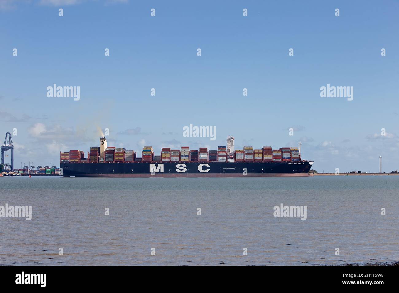 Container ship MSC Isabella leaving the Port of Felixstowe, Suffolk, UK ...
