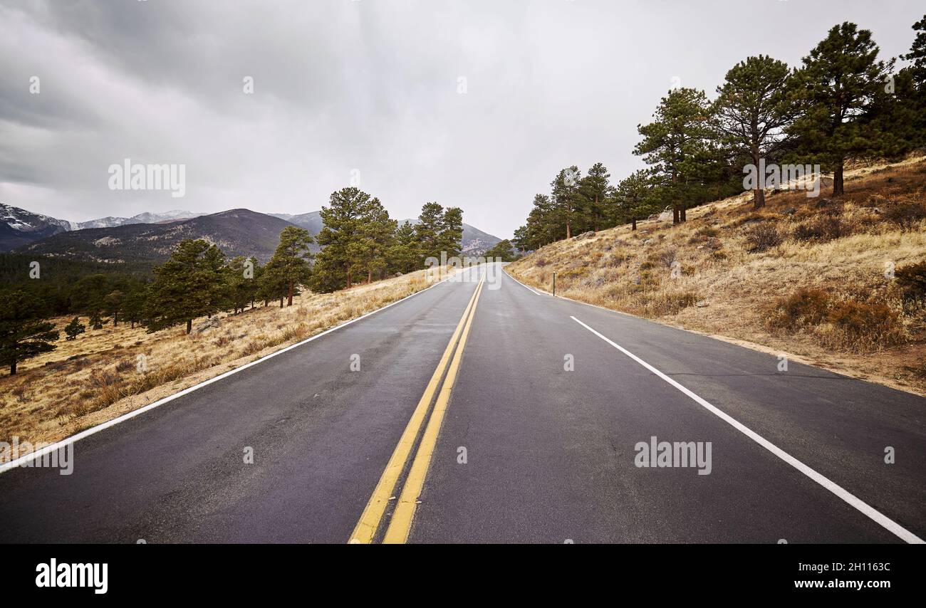 Empty asphalt road, color toning applied, Colorado, USA Stock Photo - Alamy