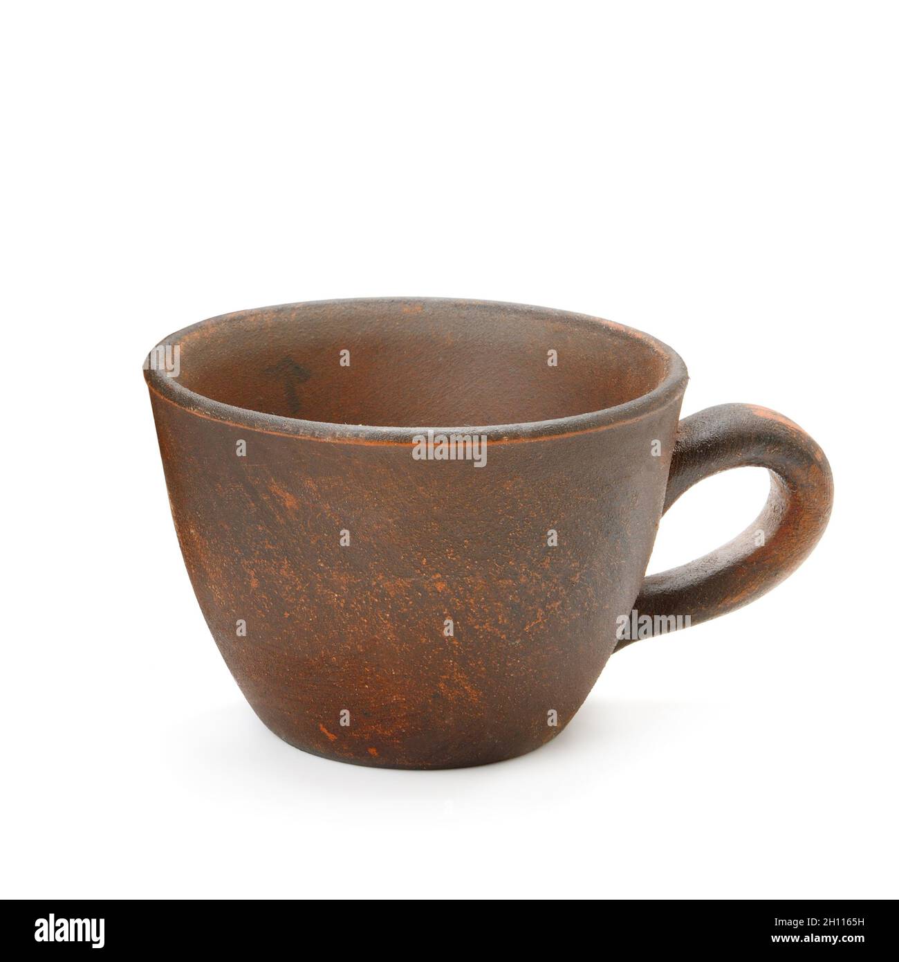 Handmade clay cup isolated on white background Stock Photo - Alamy
