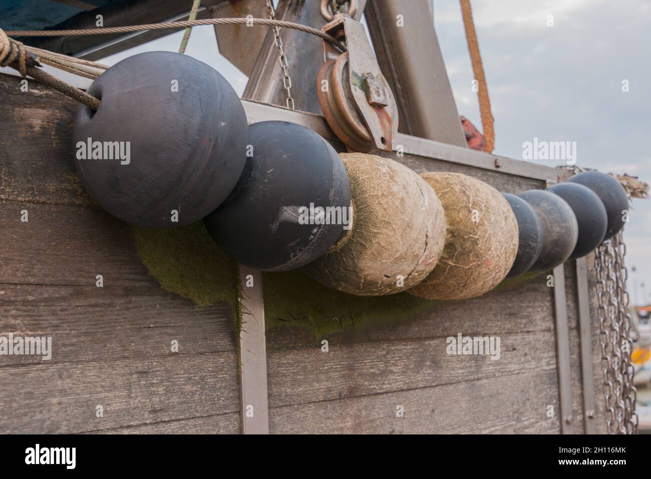 round buoys as fender and ram protection on a ship Stock Photo - Alamy