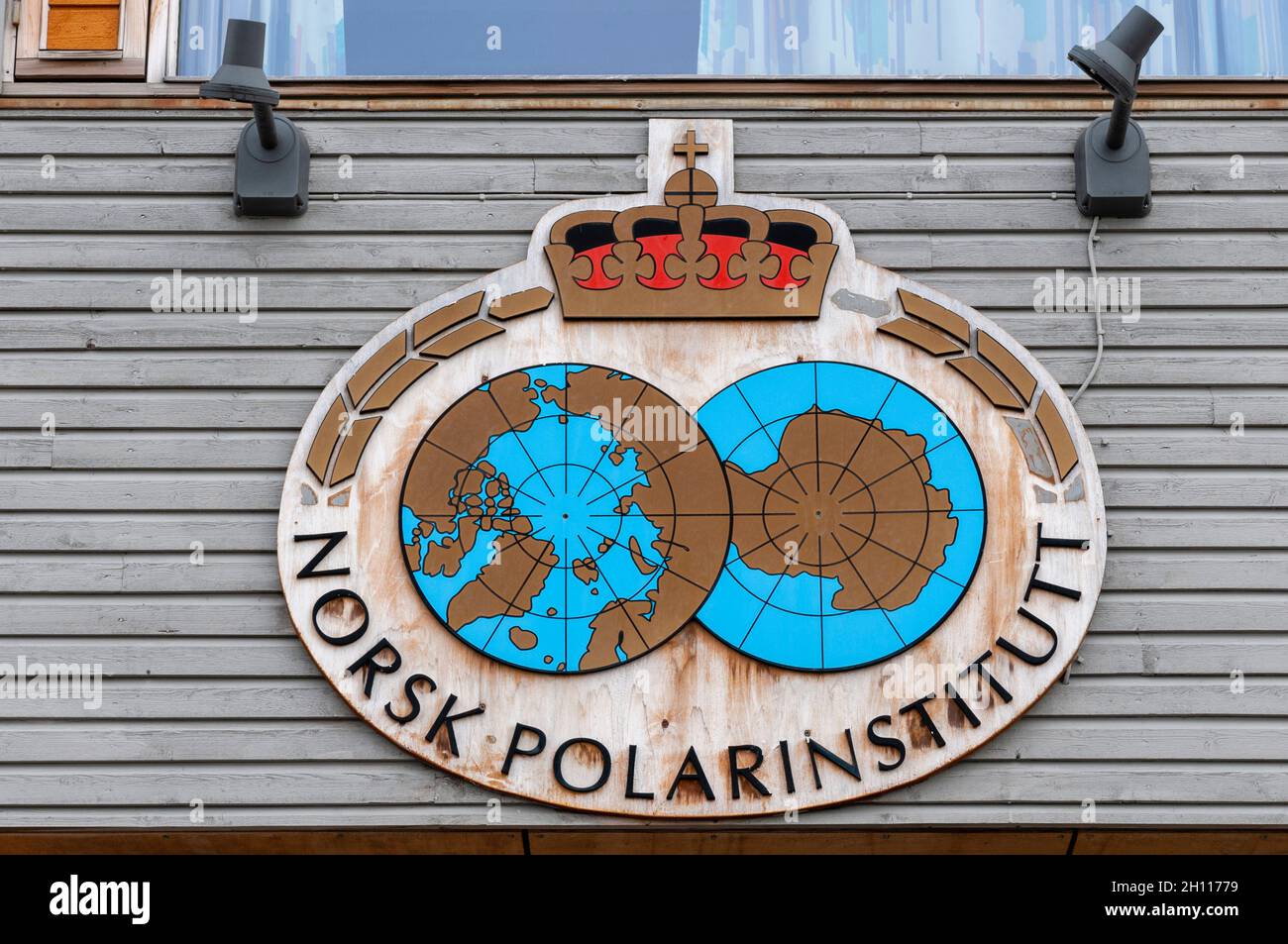 The Norway Polar Institute sign at the research station of Ny-Alesund. Ny-Alesund, Kongsfjorden ...