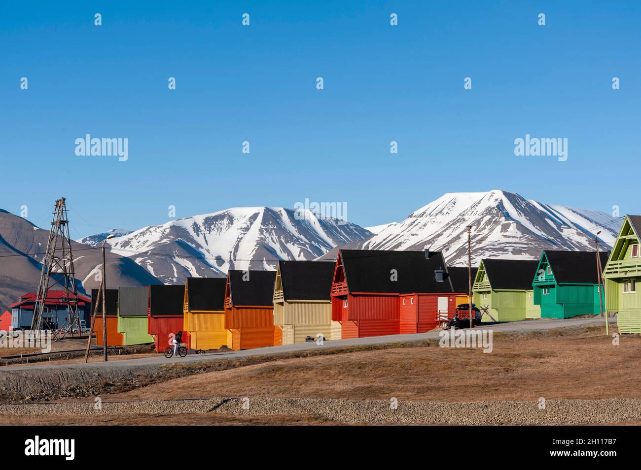Brightly painted cottages in the town of Longyearbyen. Longyearbyen ...