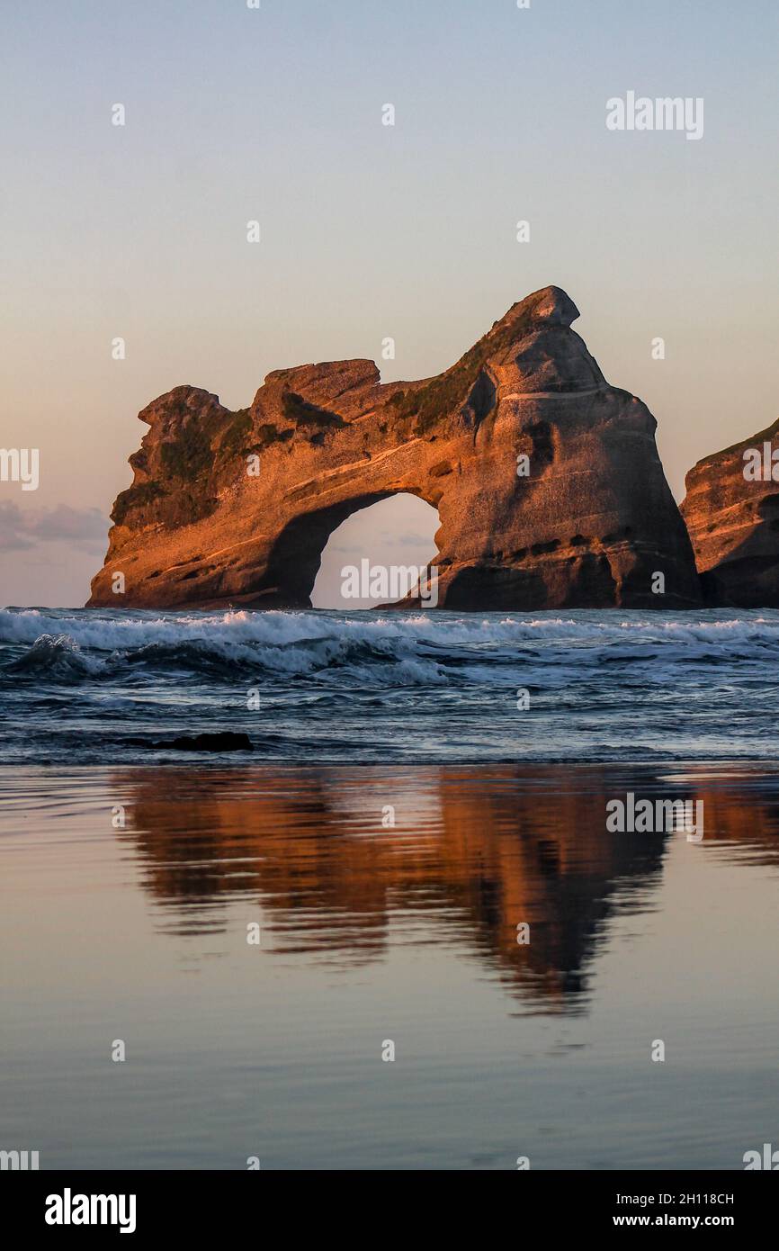 Beautiful shot of cliffs in a sea near a beach during the day Stock ...