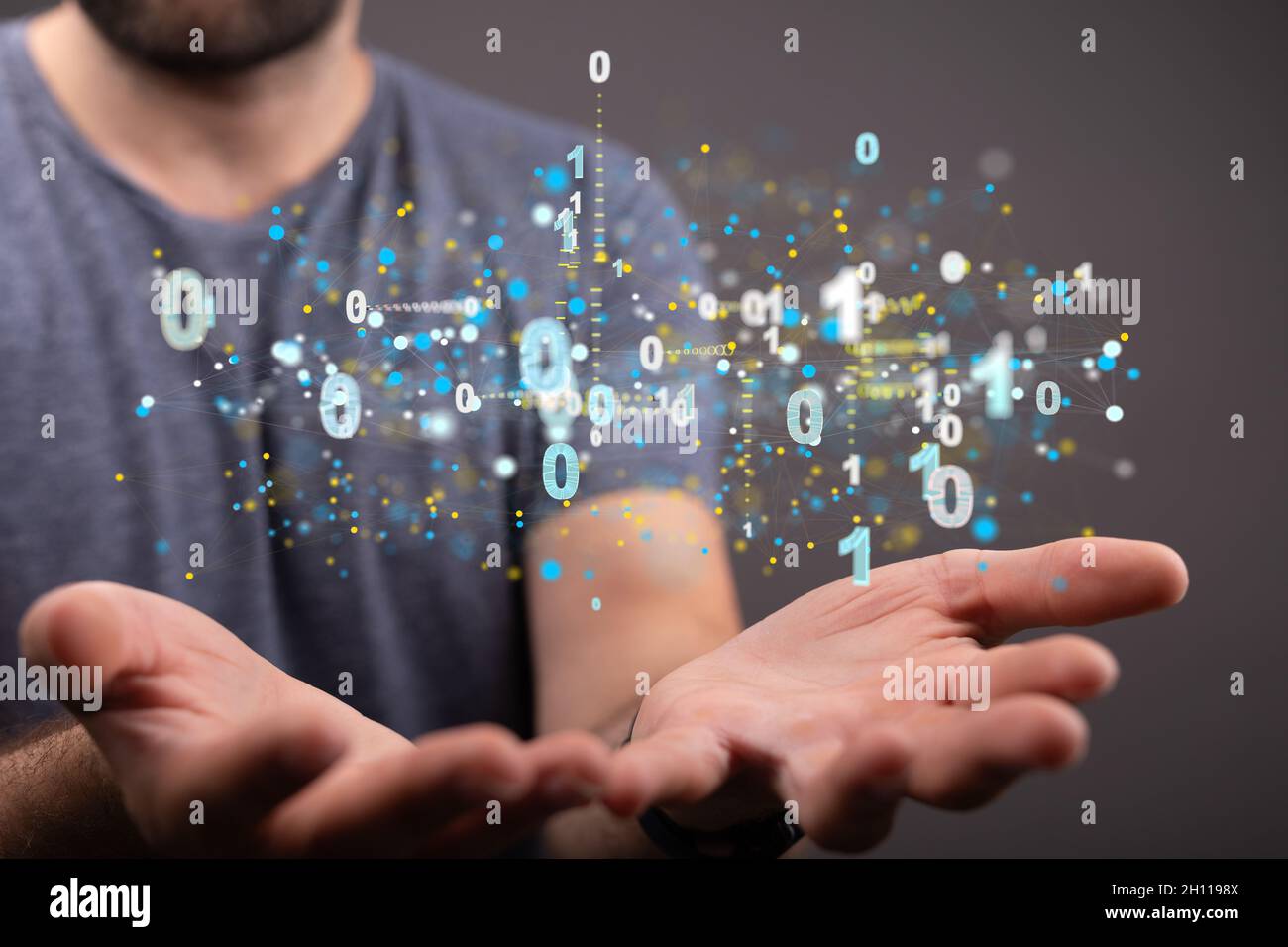 Illustration of binary codes in human hands Stock Photo - Alamy