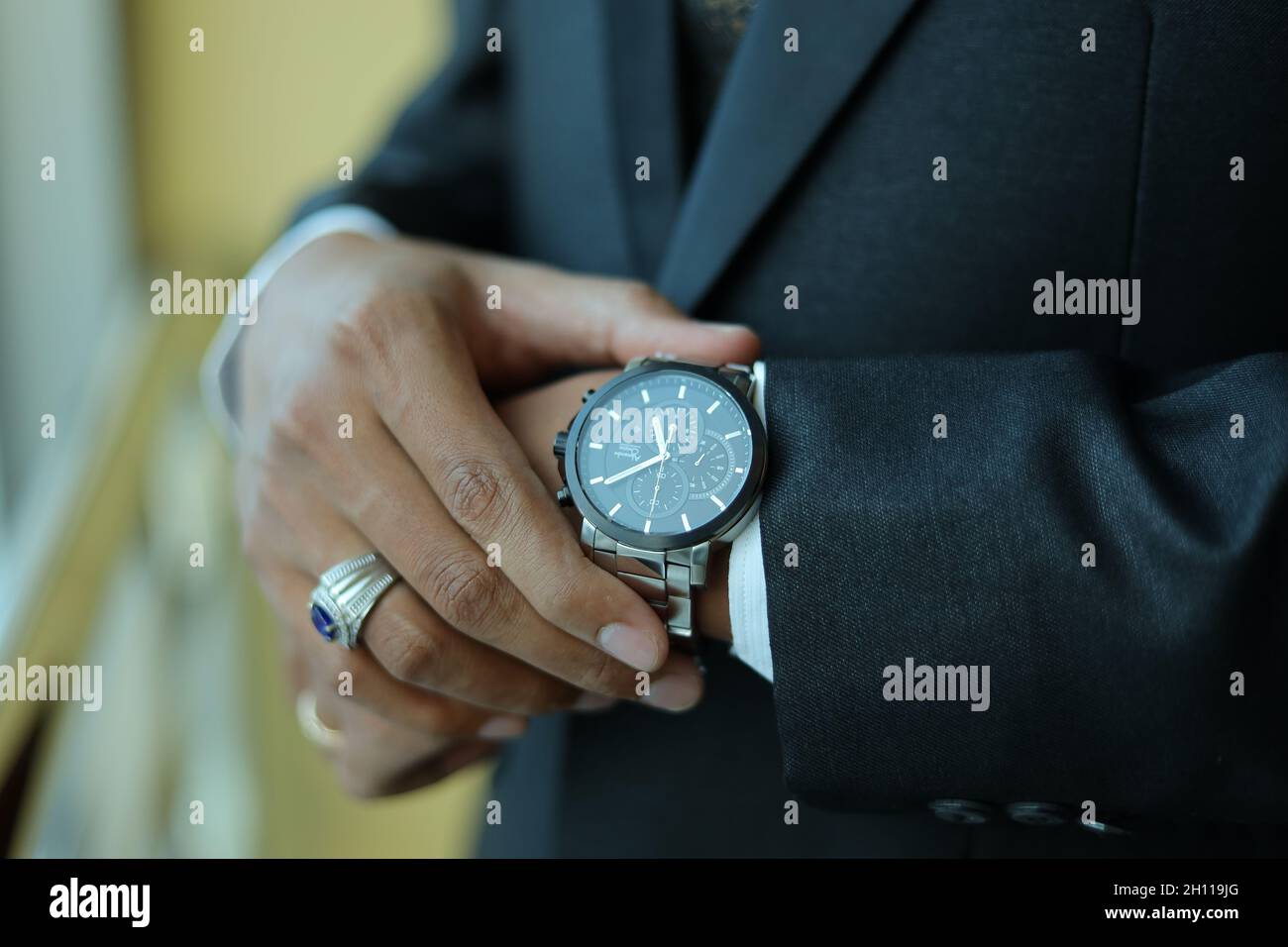 Watch on hand hi-res stock photography and images - Alamy