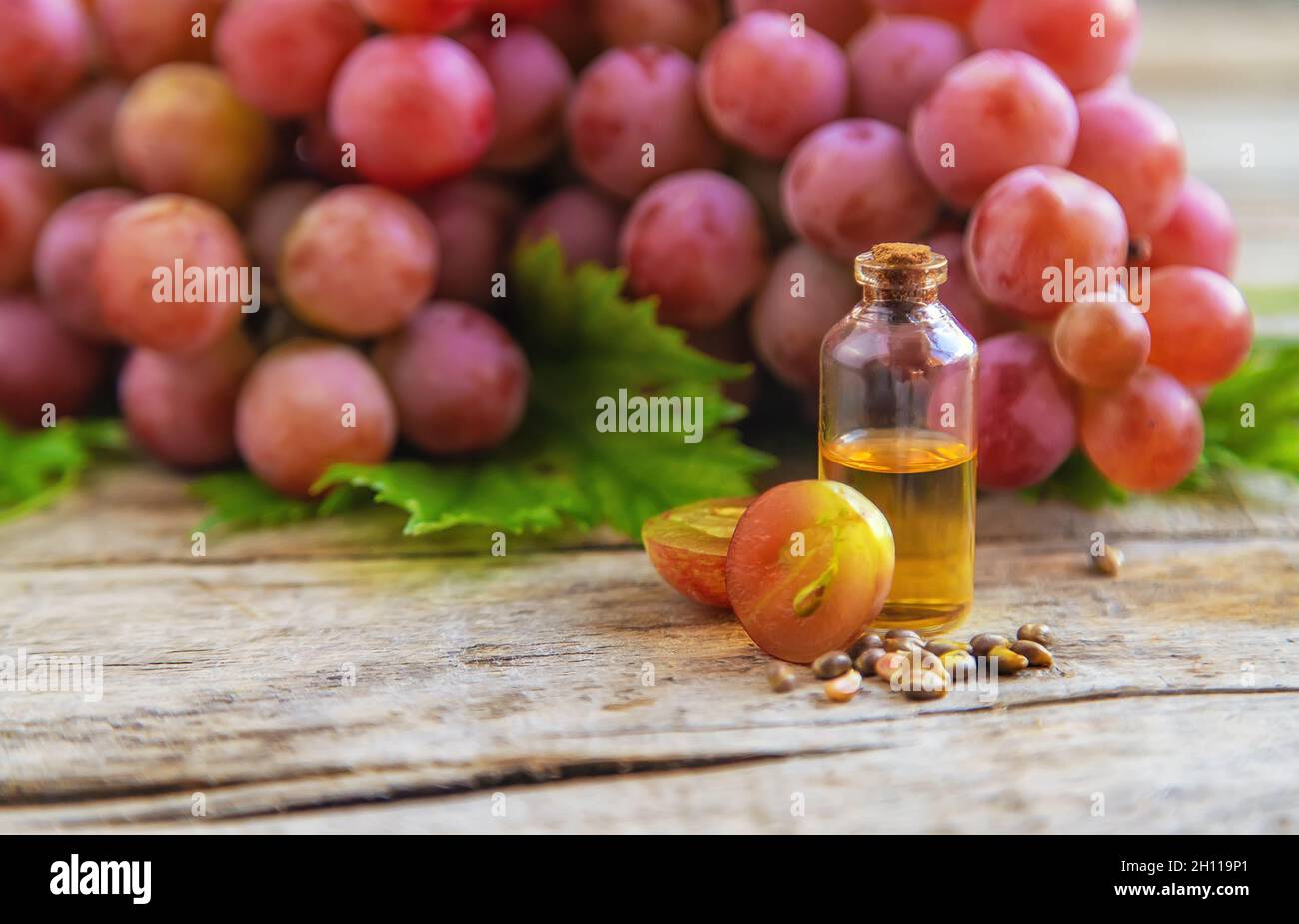 Grape seed oil in a bottle. Selective focus. Nature Stock Photo - Alamy