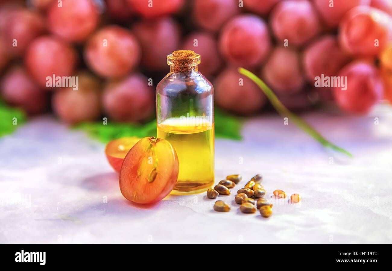 Grape seed oil in a bottle. Selective focus. Nature Stock Photo - Alamy