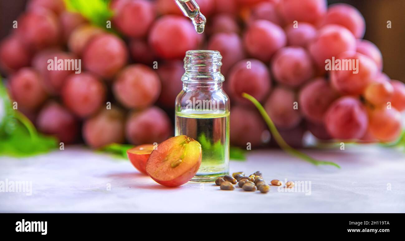 Grape seed oil in a bottle. Selective focus. Nature Stock Photo - Alamy