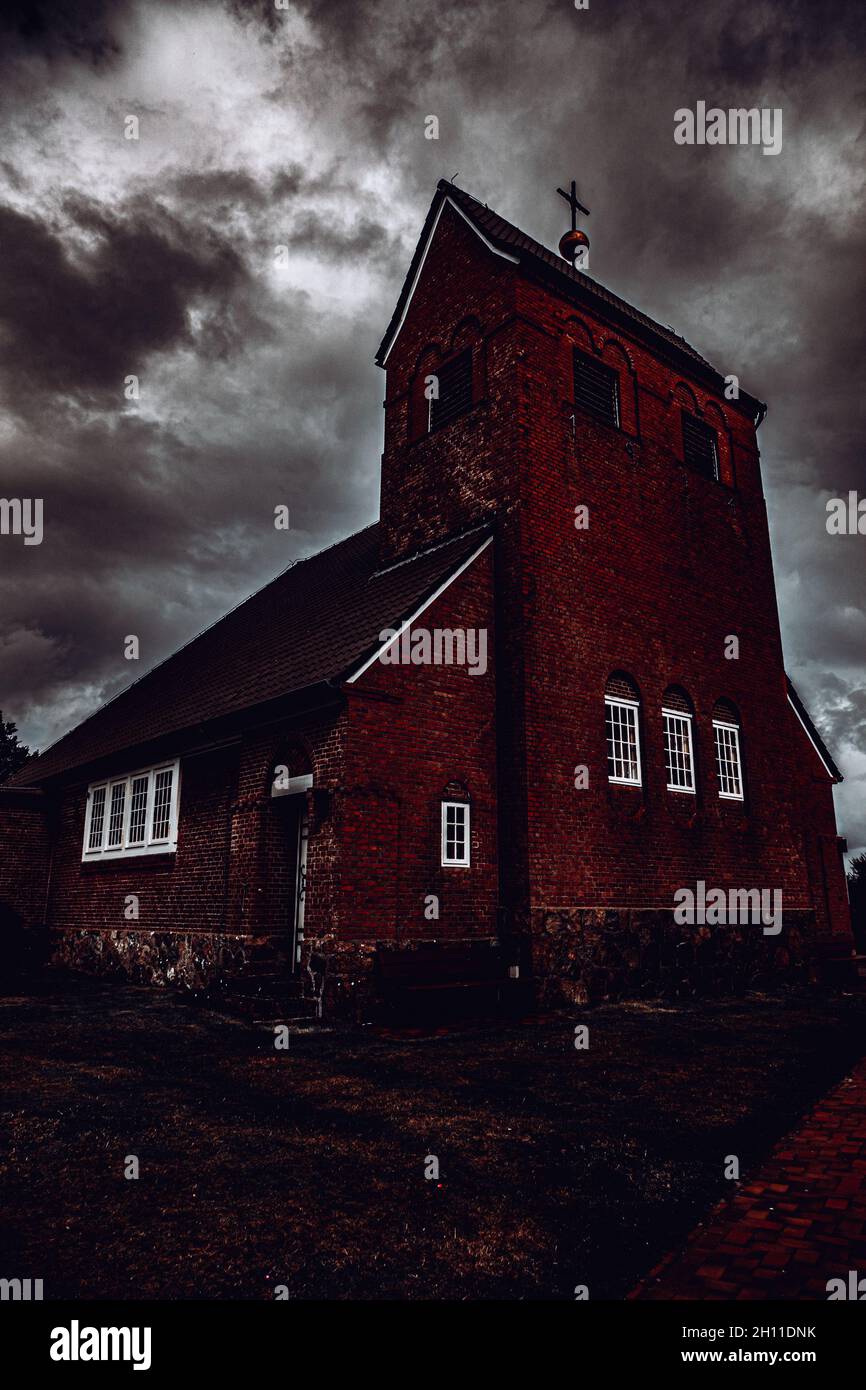 Vertical shot of a church on a gloomy day Stock Photo - Alamy
