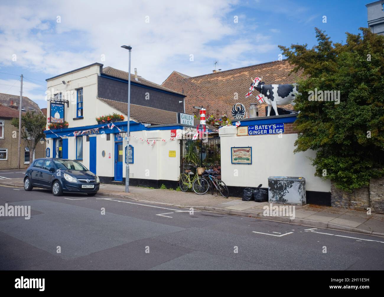 The Phoenix pub in Southsea has a life size cow on the roof of the ...