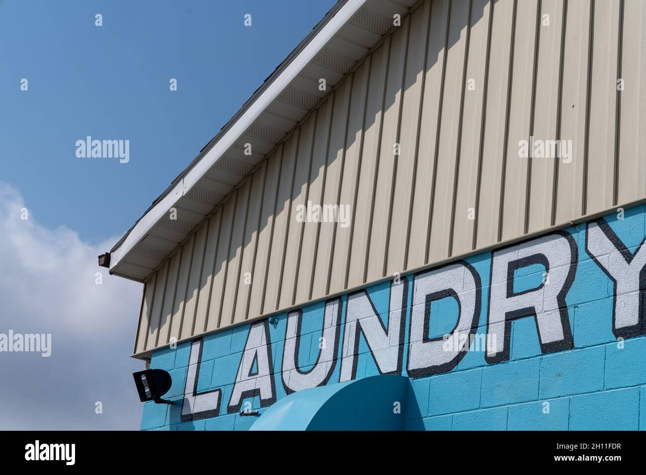 Generic Laundry sign on a laundromat building Stock Photo - Alamy