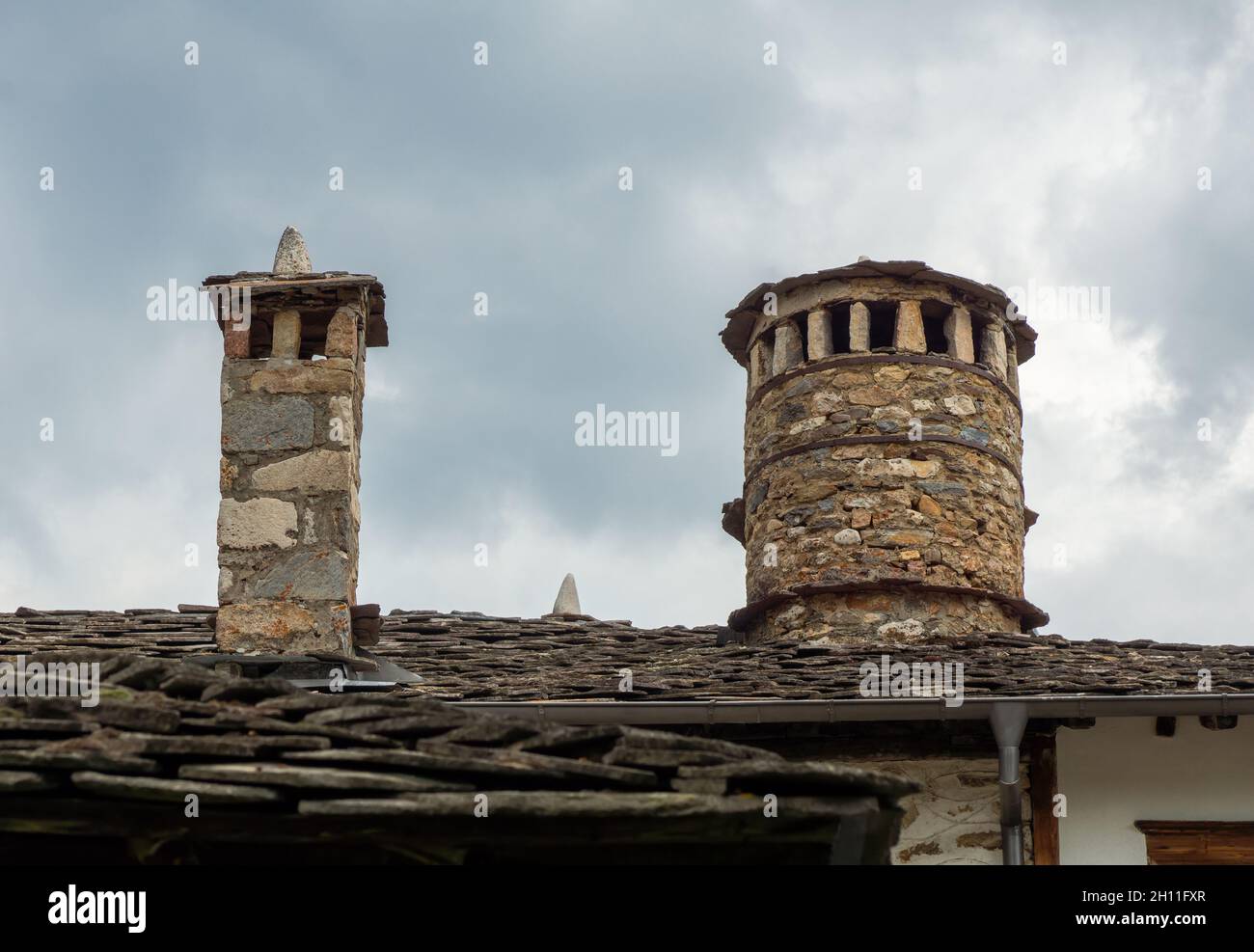 Old chimneys on house in Mogilitsa mountain village, Bulgaria Stock ...