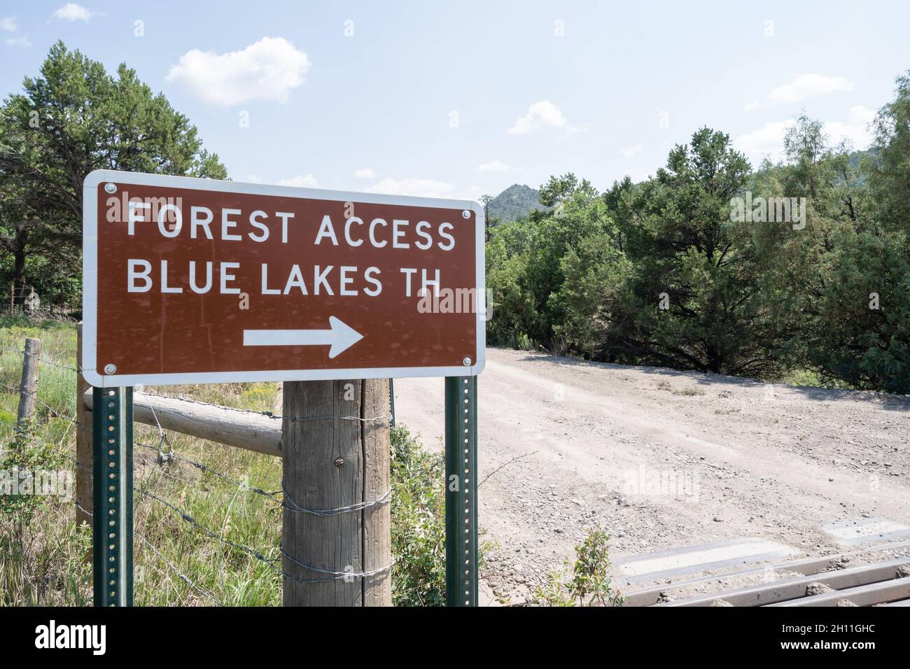 Sign leading drivers to the Blue Lakes Trailhead in Colorado Stock ...