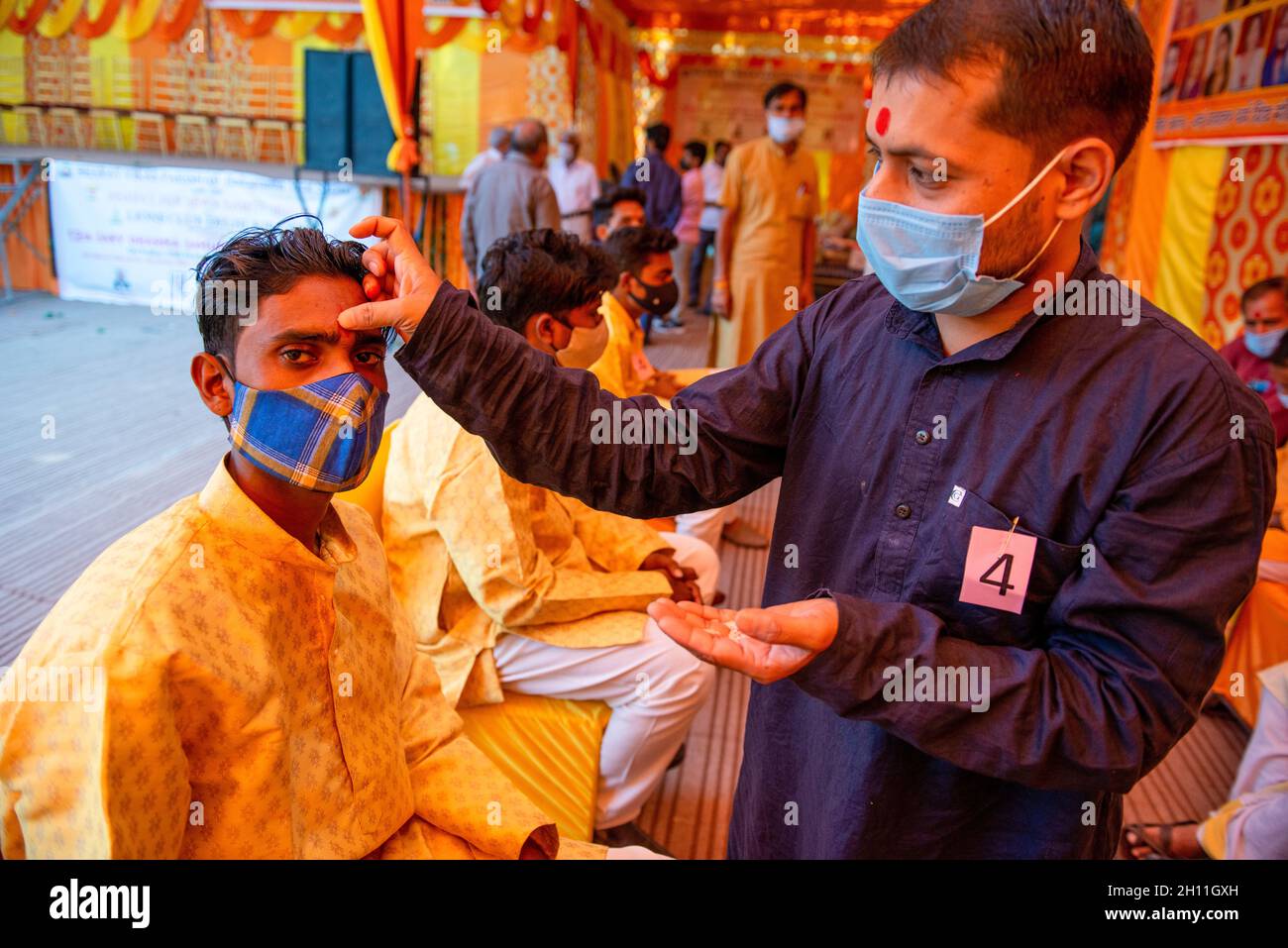 Applying tilak hi-res stock photography and images - Alamy