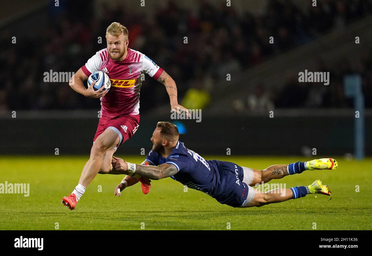 Harlequins' Tyrone Green (left) skips away from Sale Sharks' Byron ...