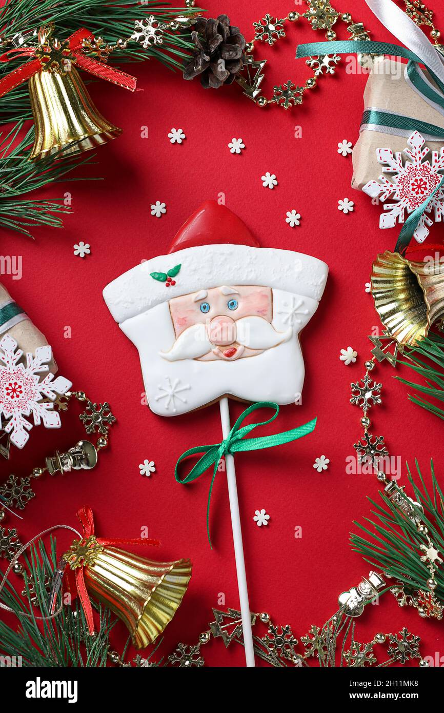 Gingerbread Santa with gifts on red background. Happy New Year ...