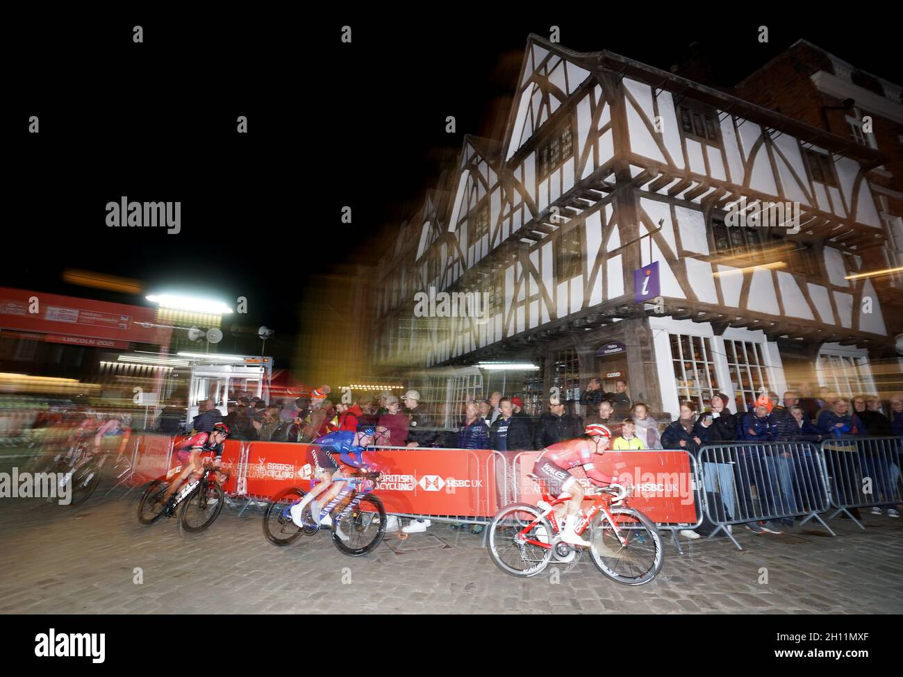 Spectators watch racers go by during the British Cycling National ...