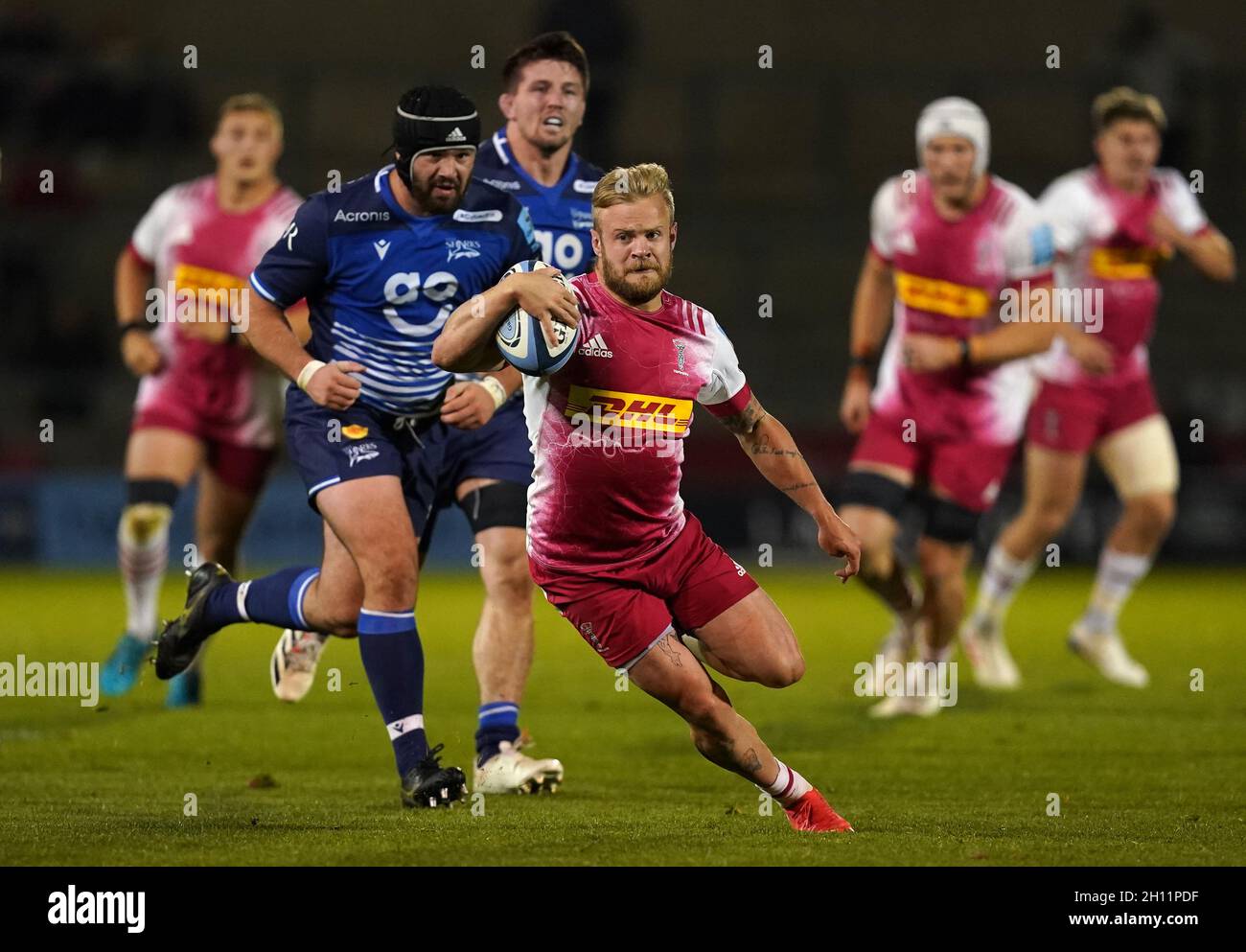 Harlequins' Tyrone Green breaks free before scoring their side's second ...