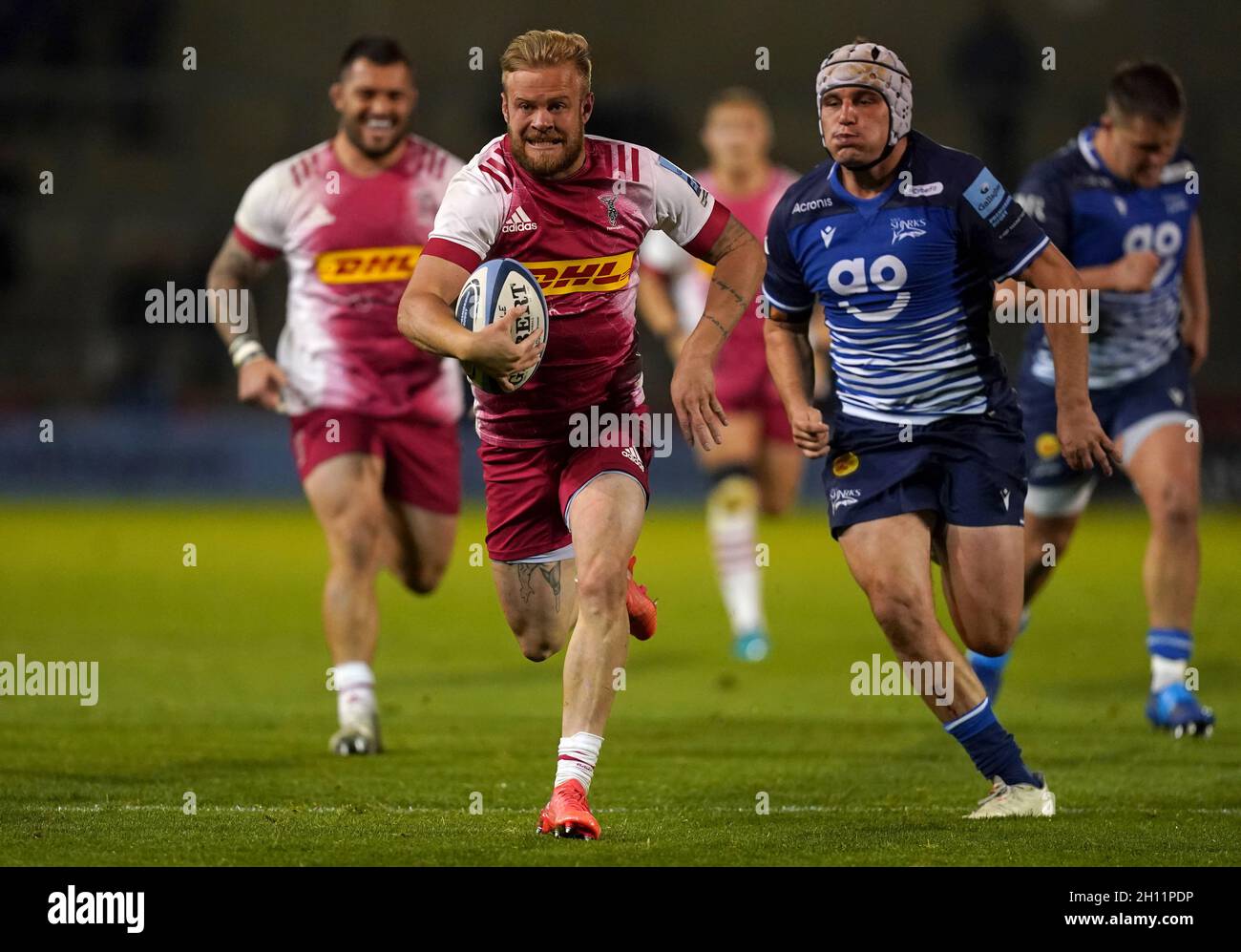 Harlequins' Tyrone Green breaks free before scoring their side's second ...