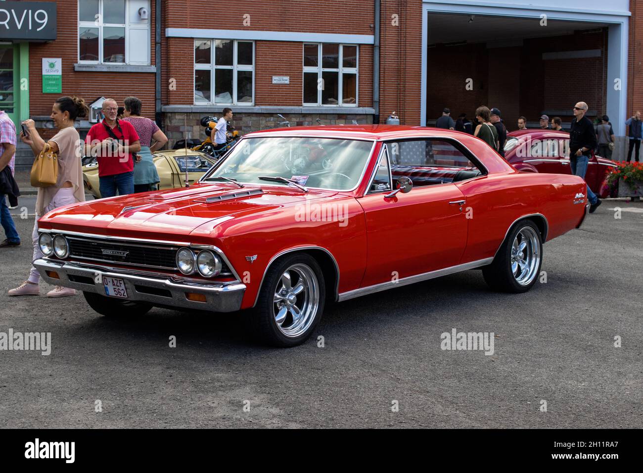 LIEGE, BELGIUM - Sep 12, 2021: A closeup shot of a red sports car at a ...
