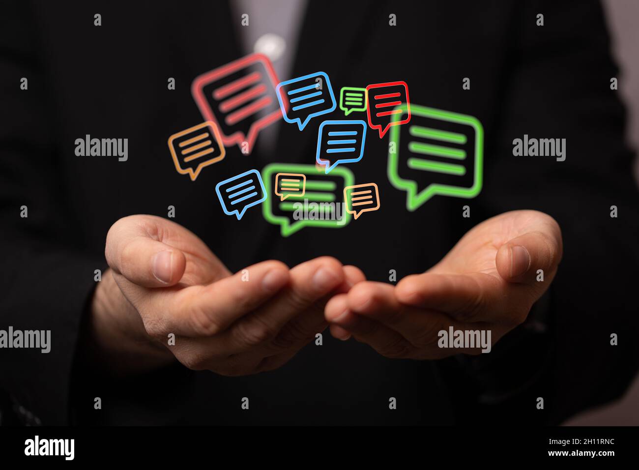 Human hand showing network communications with email symbols Stock ...
