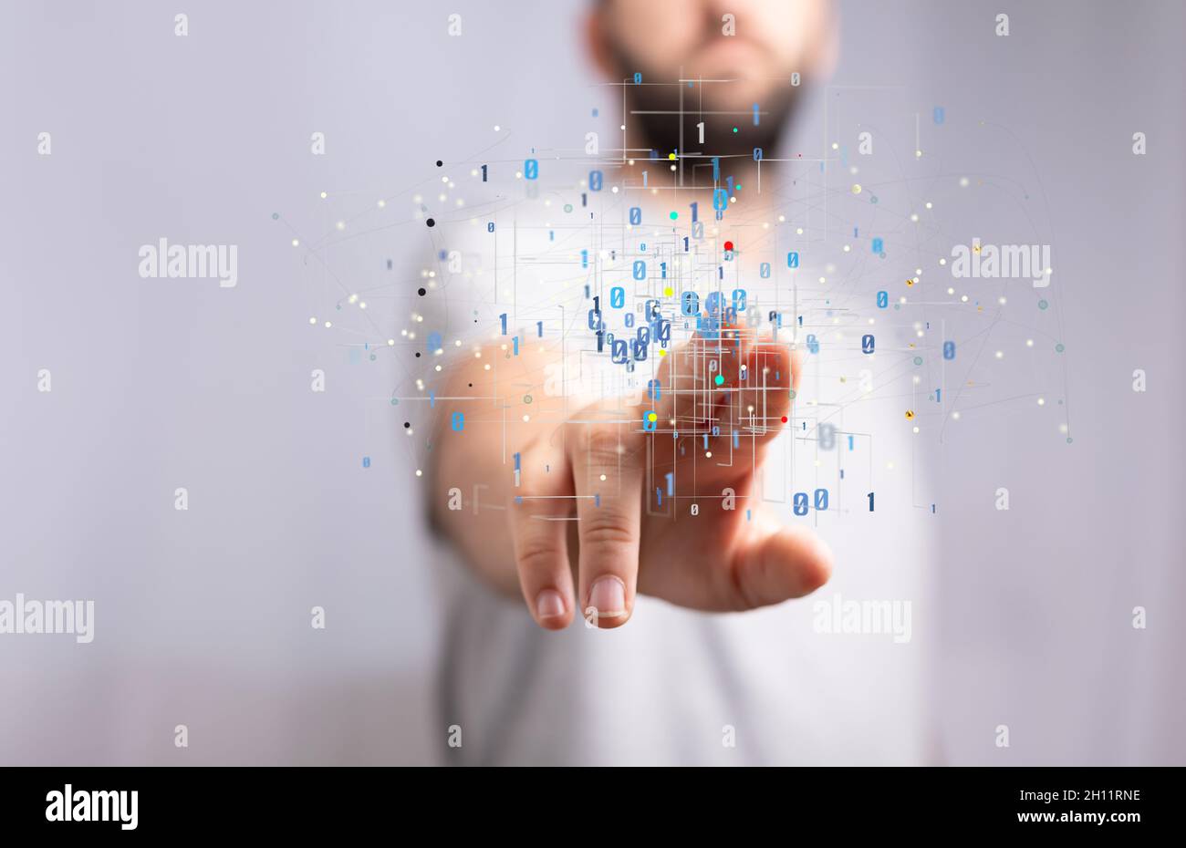Illustration of binary codes and a human hand touching a transparent ...