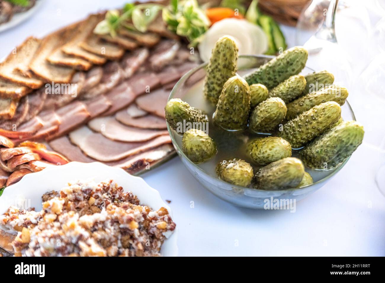 Meats on the table, lard and pickled cucumbers. Polish food, cold ...