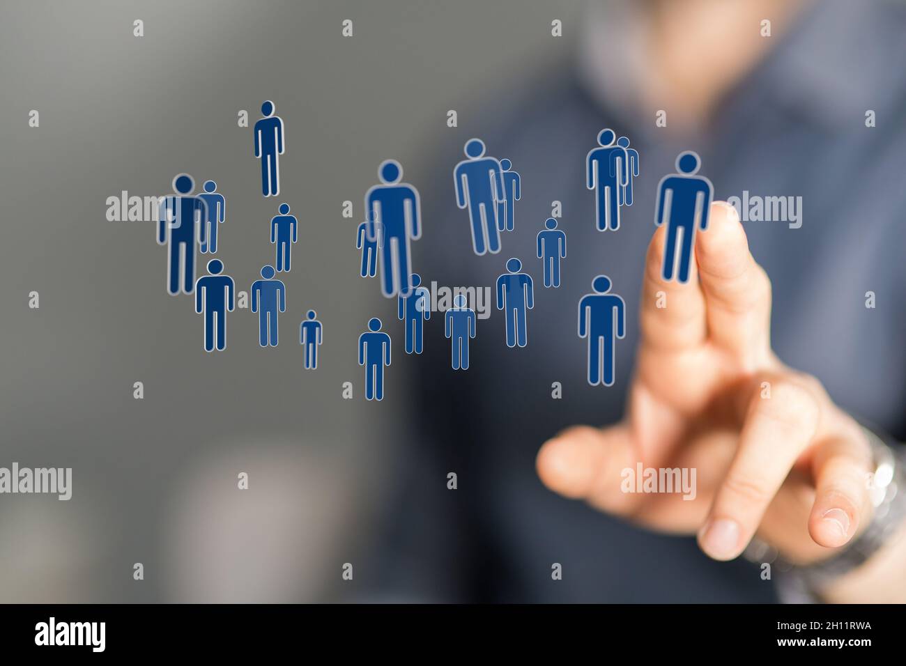 Man's fingers interacting with 3D render organization chart team ...